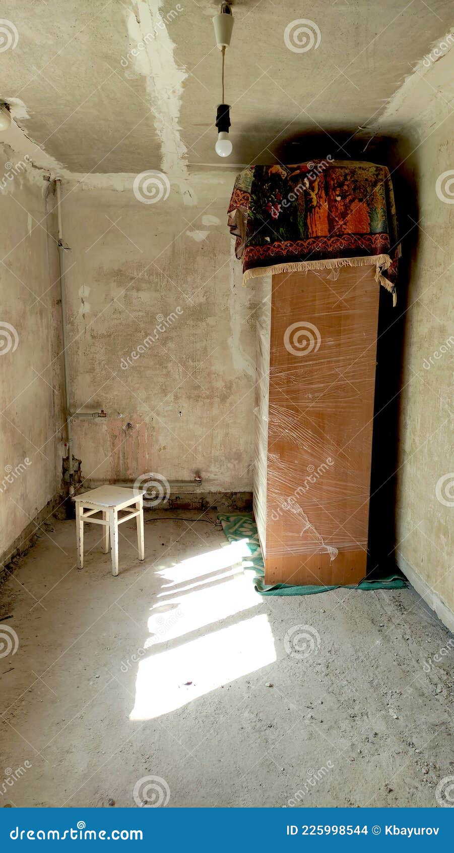 View of an Abandoned Empty Room with a Wardrobe and a Stool Stock Photo ...