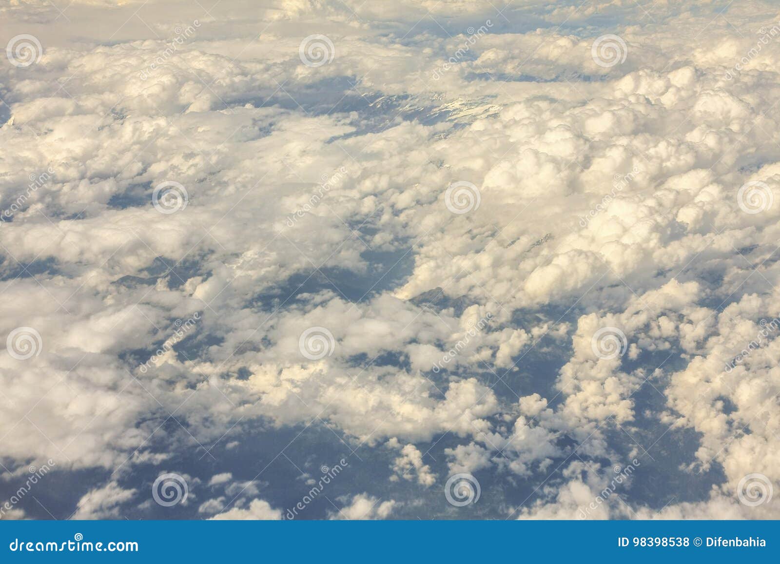 View from Above the Clouds. Flying Over Clouds in Plane Stock Photo ...