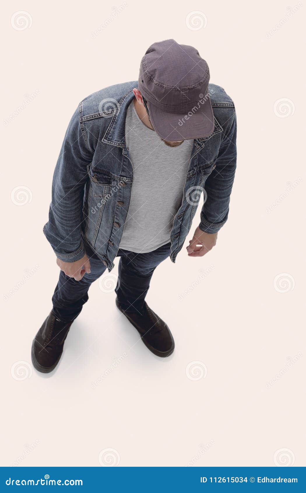 View from Above. Guy in a Baseball Cap and Denim Jacket Stock Photo ...