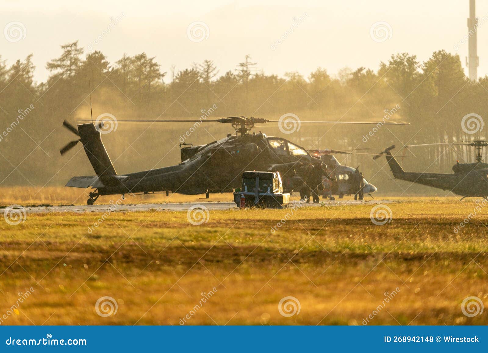 View of the AH64 Apache Taking Off during the Rainy Sunset Editorial ...