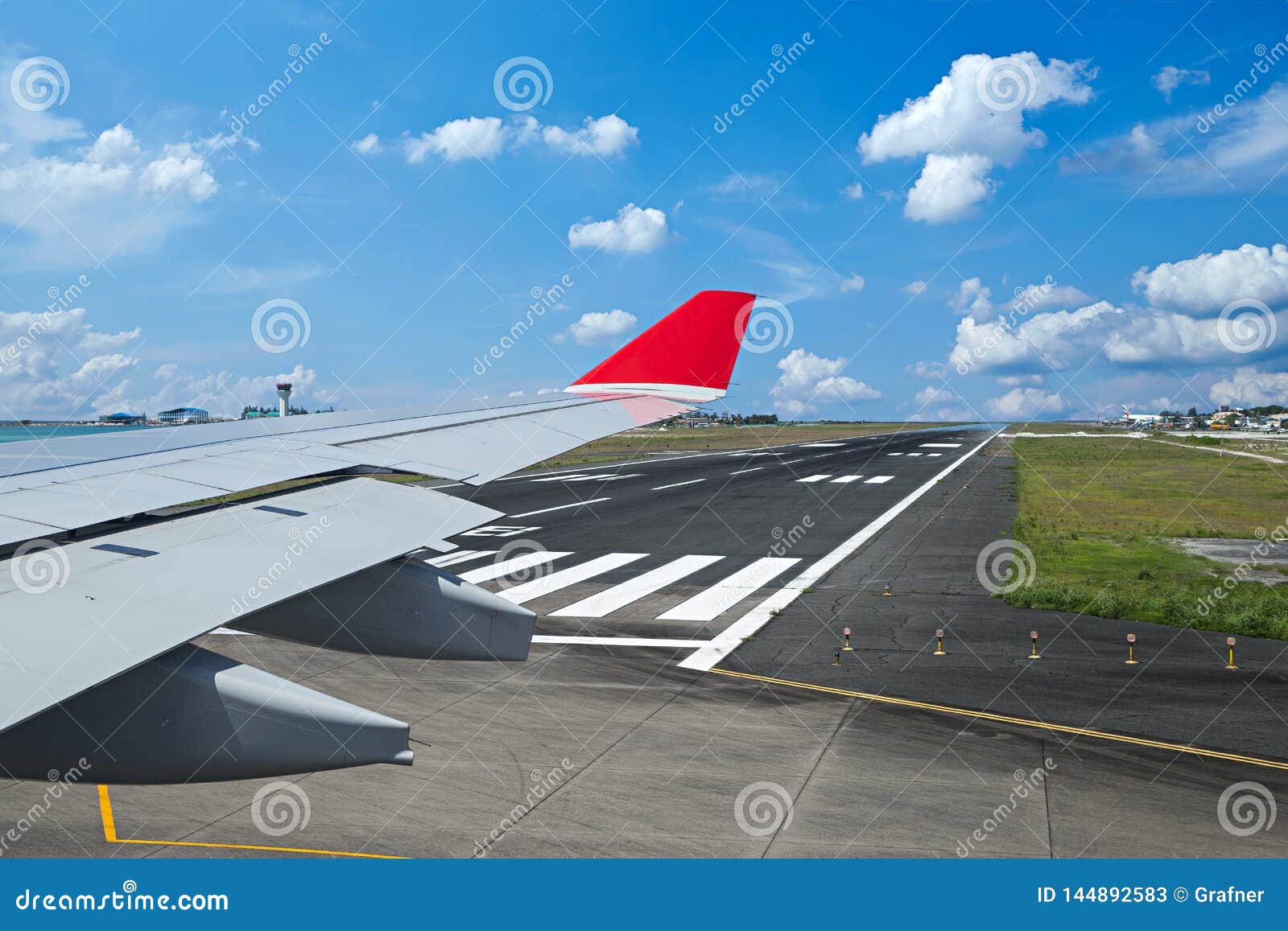 View from Airplane with Wing on Airport Runway Ready for Takeoff in ...
