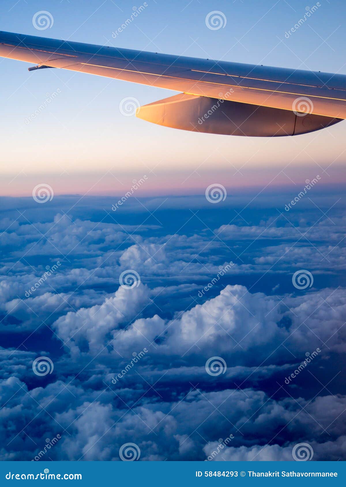 View of Airplane Wing during Sunset Stock Image - Image of puffy, plane ...