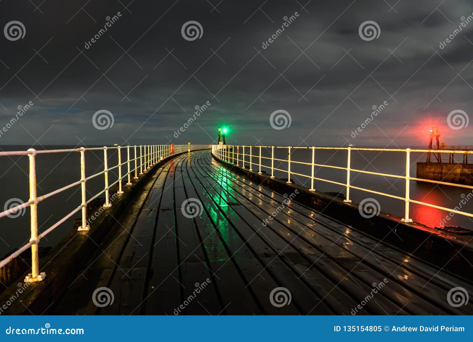 Whitby Lighthouse at night stock image. Image of icon - 135154805