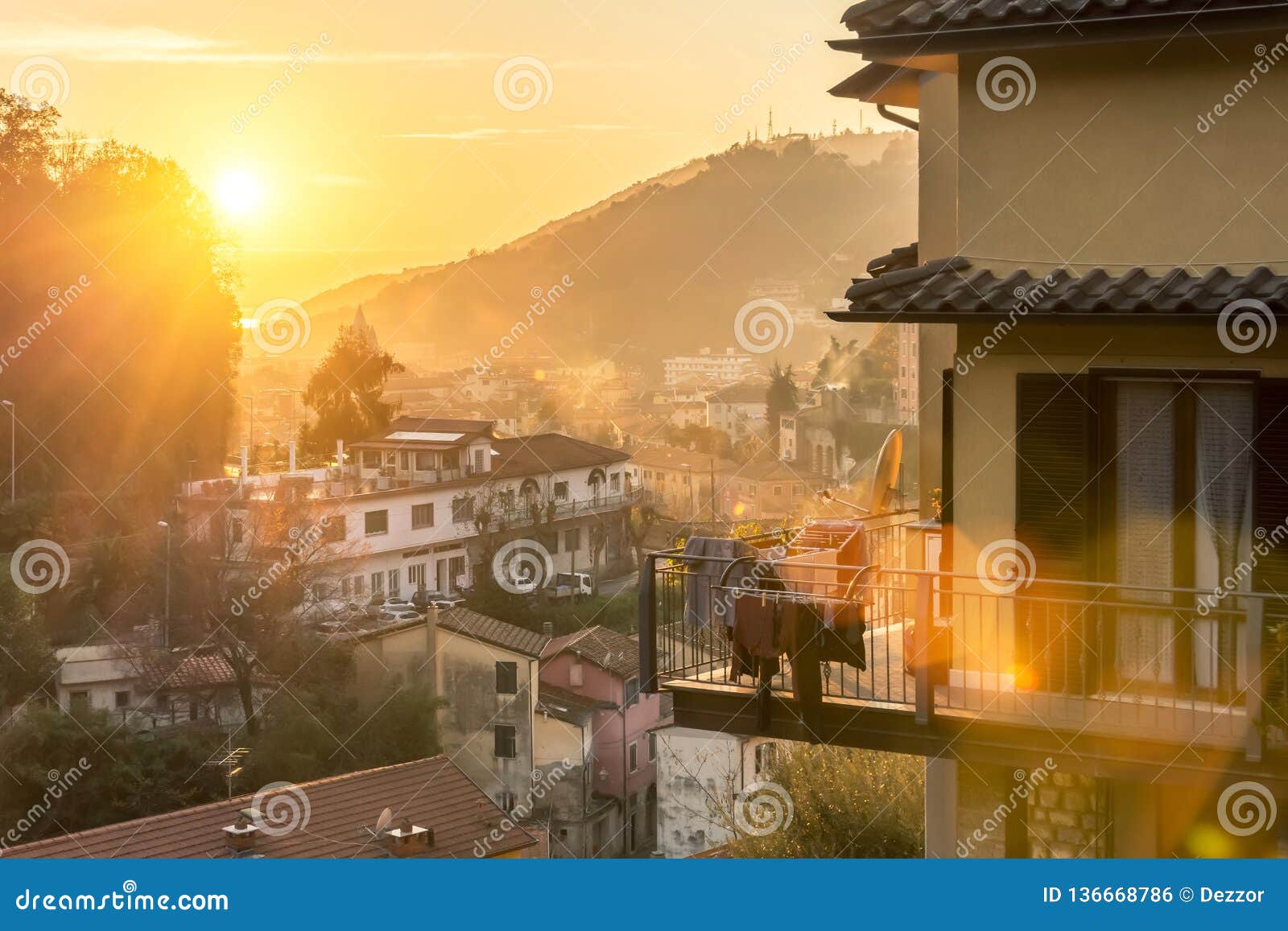 View of Alpine Hills and Town at Sunset Stock Photo - Image of hill ...