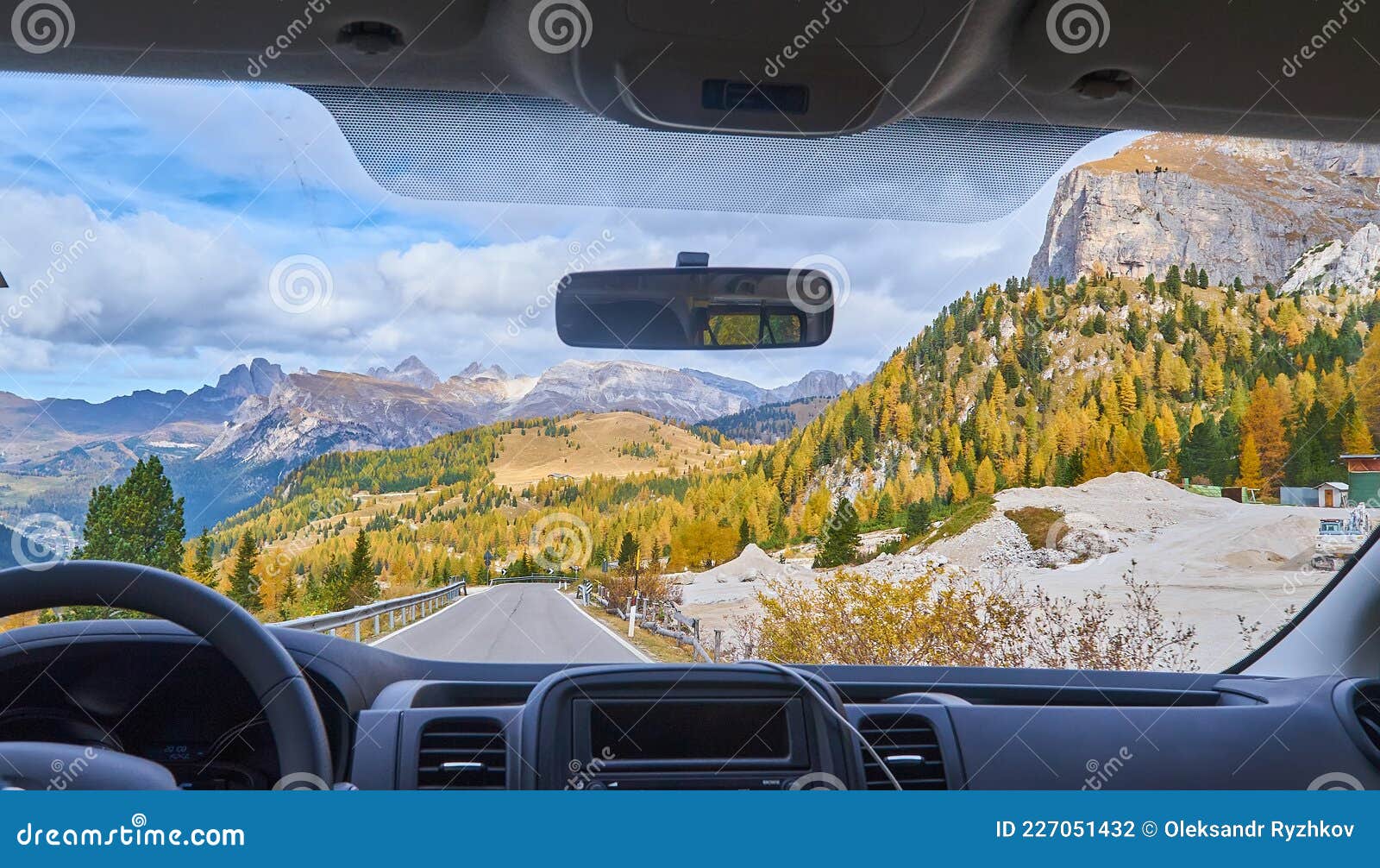 View on the Alps through the Windscreen of the Car while Driving on the ...
