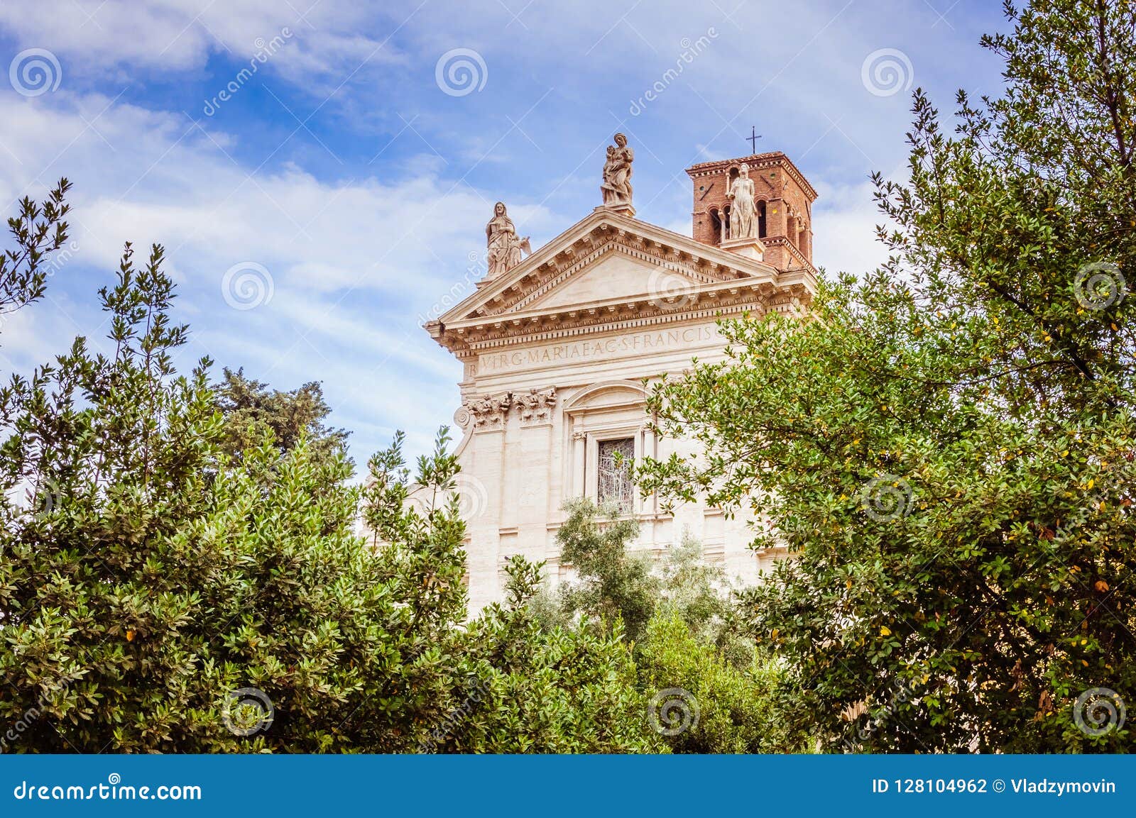 View on Ancient Cathedral between the Trees with Blue Cloudy Sky Stock ...