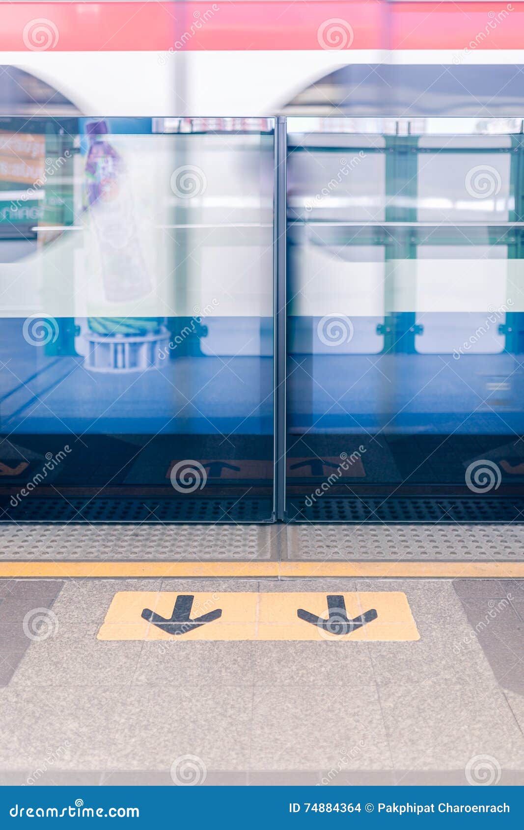 View of Arrows Sign on Platform at Sky Train Station. - Split To Stock ...