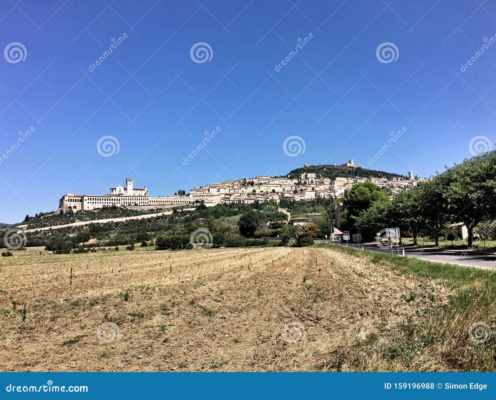 A view of Assisi in Italy stock photo. Image of road - 159196988
