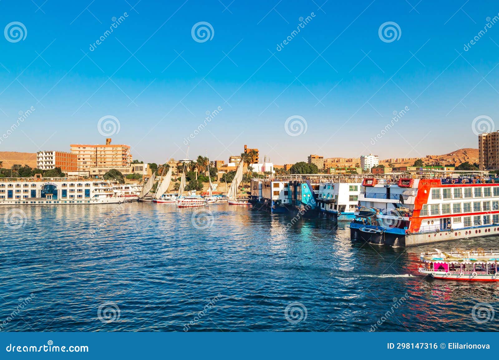 View of the Aswan Waterfront from the Nile River Stock Photo - Image of ...