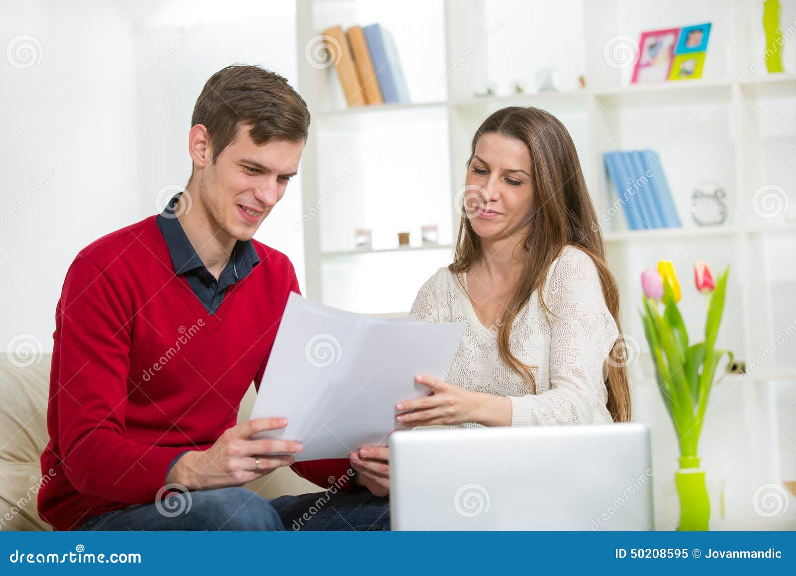 View of an Attractive Couple Doing Administrative Paperwork Stock Image ...