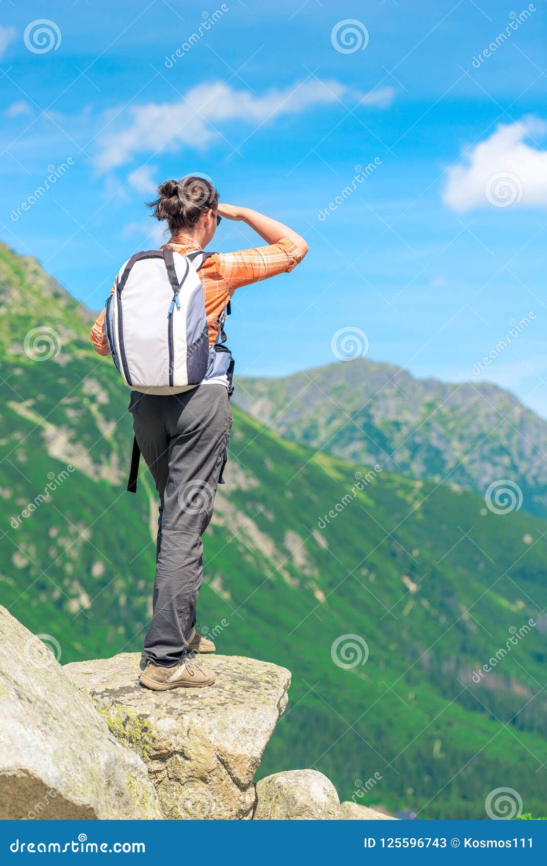 View from the Back of a Tourist with a Backpack in the Mountains Stock ...