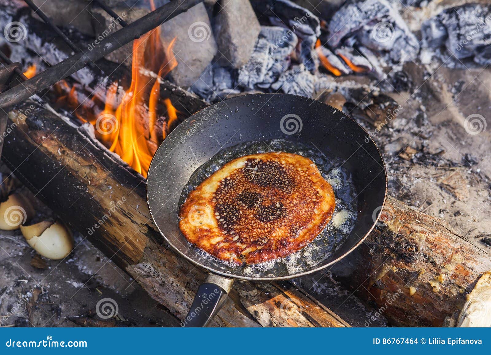 View Background Pancakes on a Fire in the Open Air on a Holiday ...