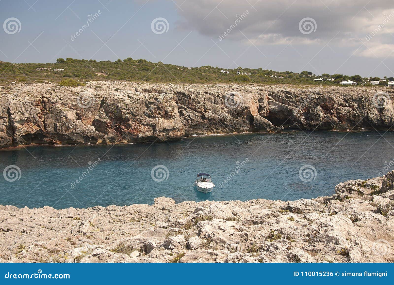 View of the Bay of Cala Binidali Stock Photo - Image of rocks, panorama ...