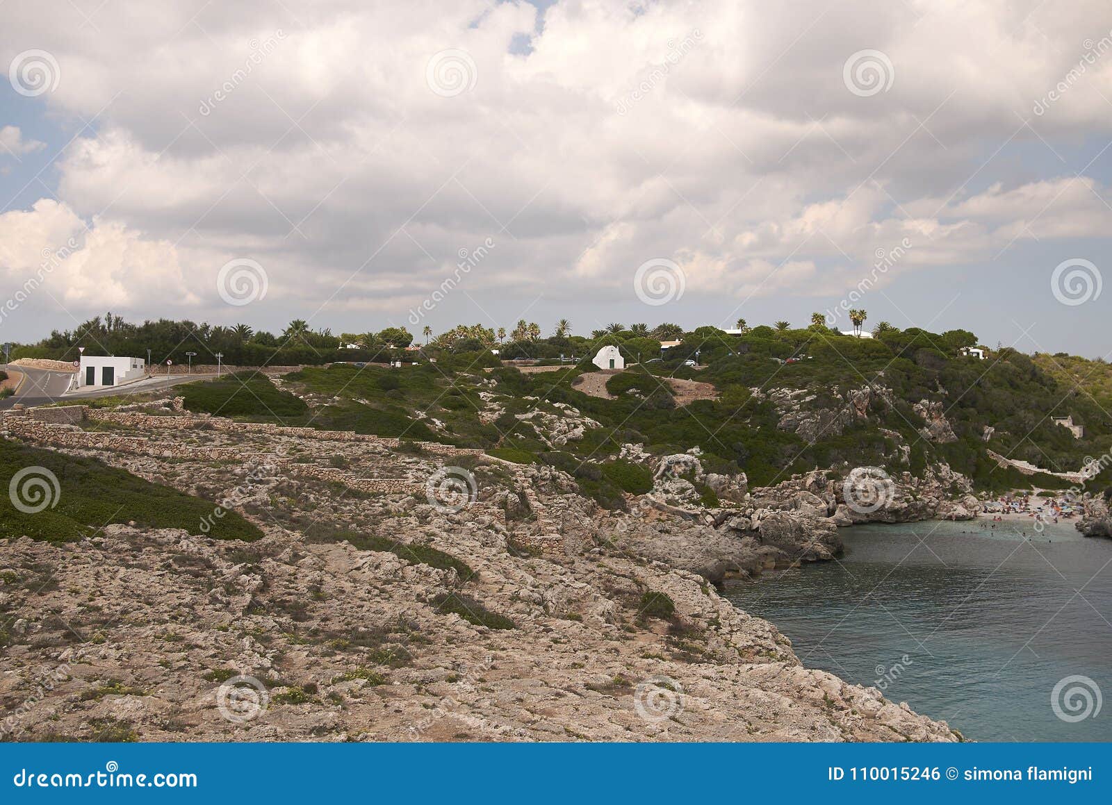 View of the Bay of Cala Binidali Stock Photo - Image of cliffs ...