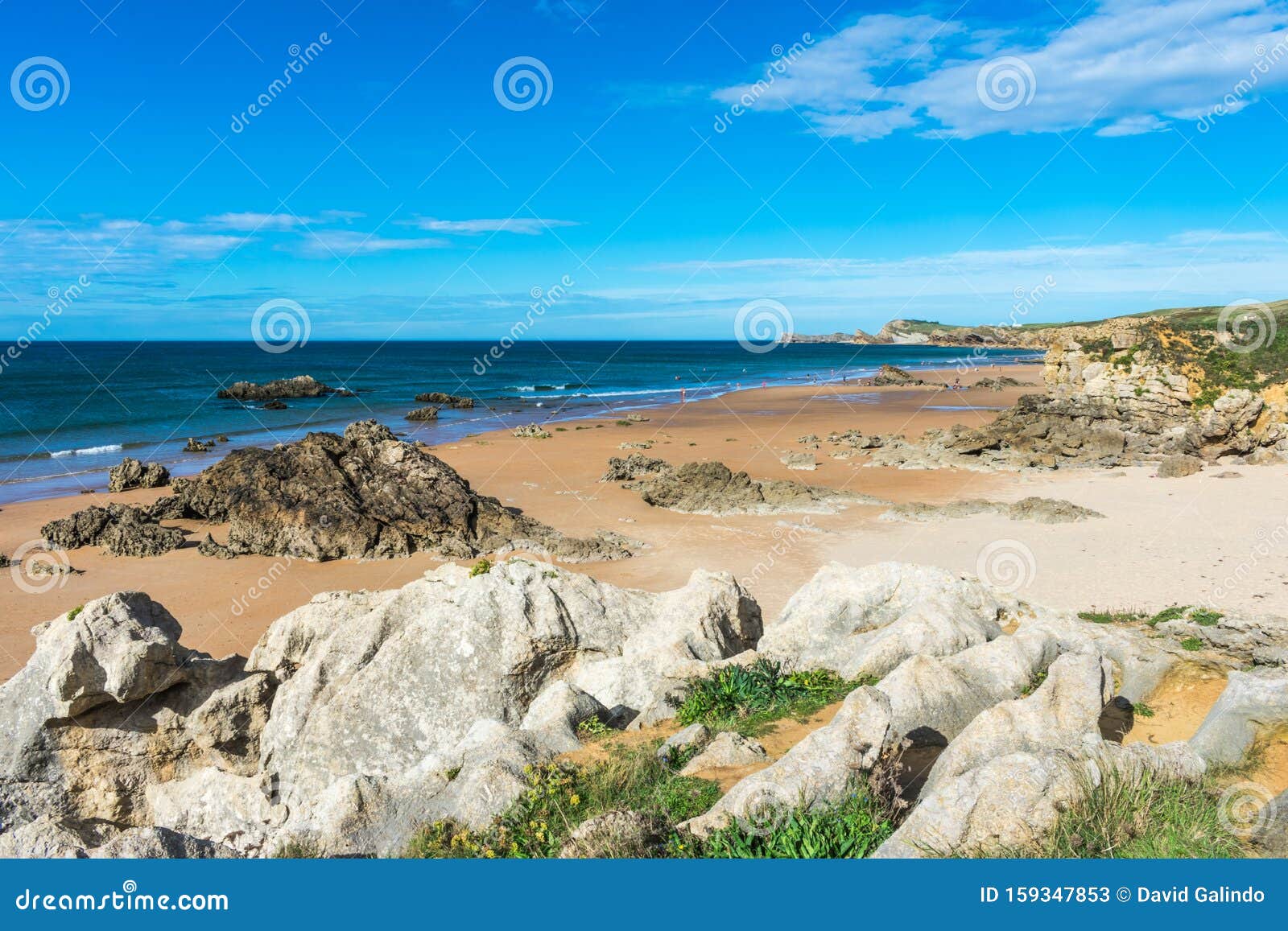 View of the Beach with Rocks and Sand between Cliffs Stock Image ...