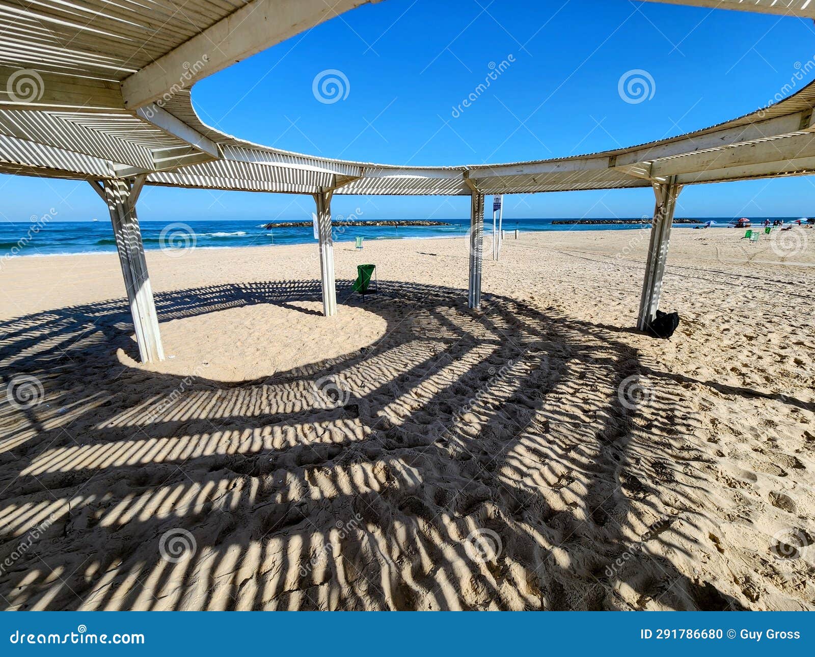 View of Beach with Shade Construction and Sand Dunes Stock Photo ...