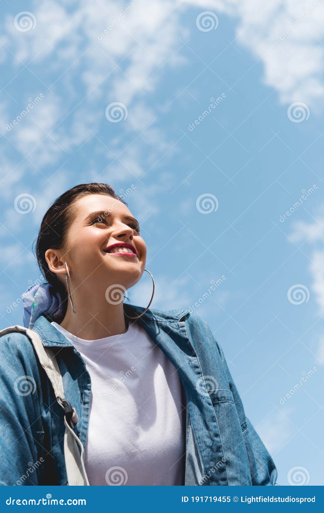 View of Beautiful Girl Looking Forward and Smiling on Sky Backgroung ...