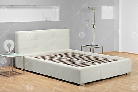 View of a bed in a bedroom stock image. Image of luxury - 15232117