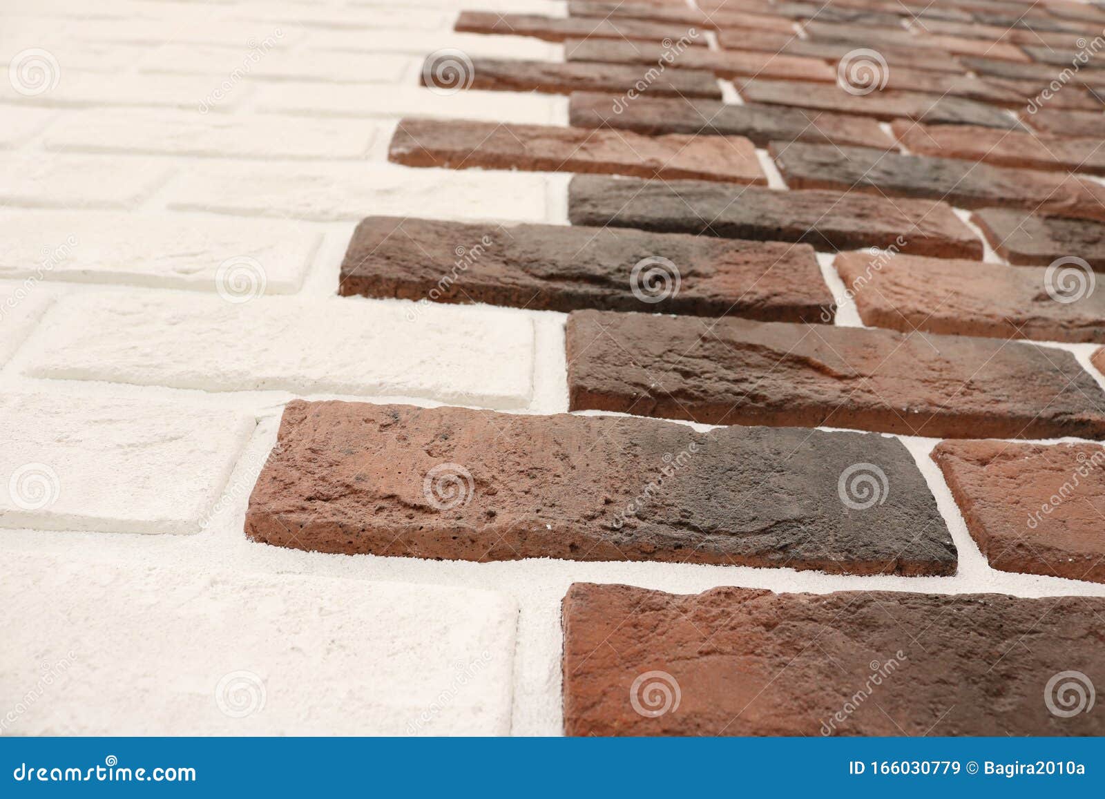 View of the Beginning of the Wall of White and Brown Bricks Divided in ...