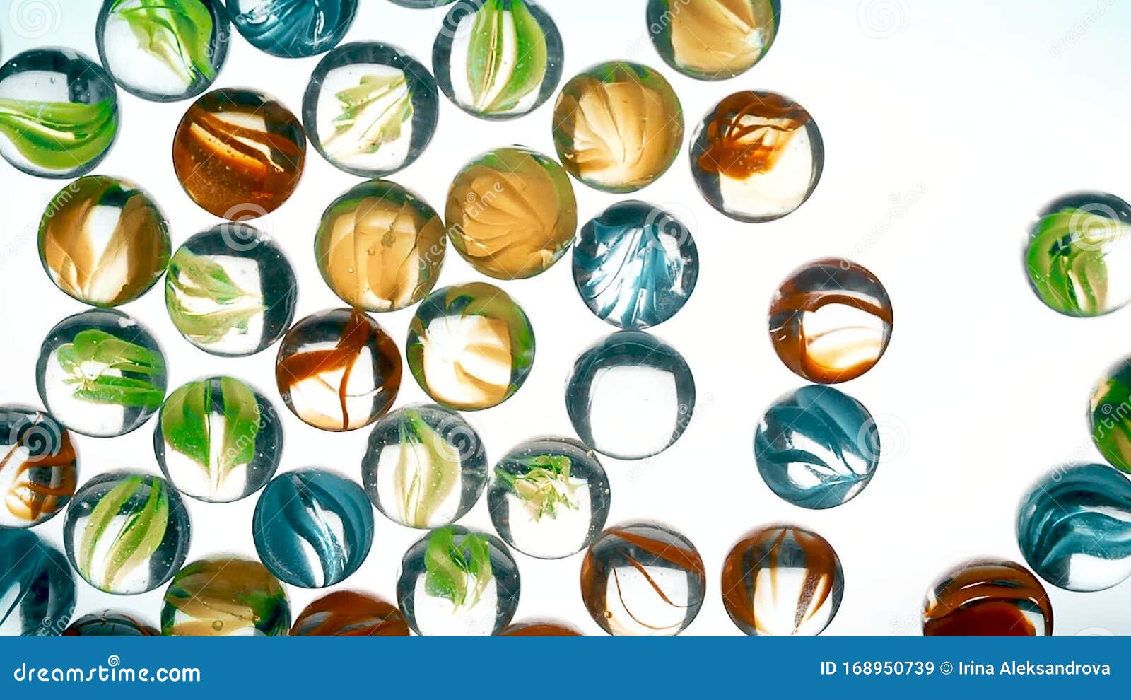 View from Below As the Hand Throws Small Multi-colored Colored Plastic ...