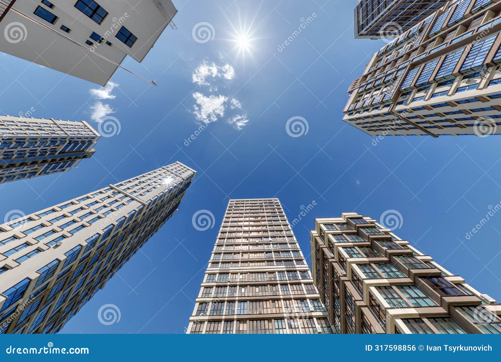 View from Below into Blue Sky with Clouds of Large Modern Skyscraper ...