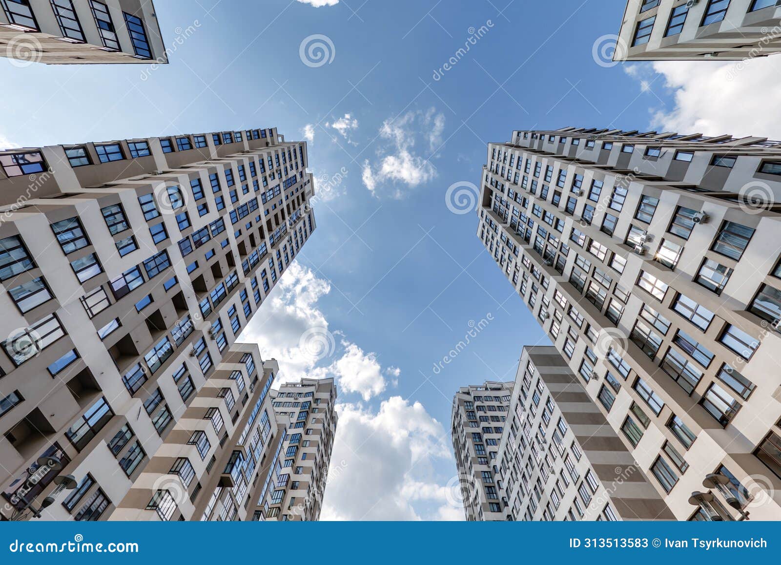 View from Below into Blue Sky with Clouds of Large Modern Skyscraper ...