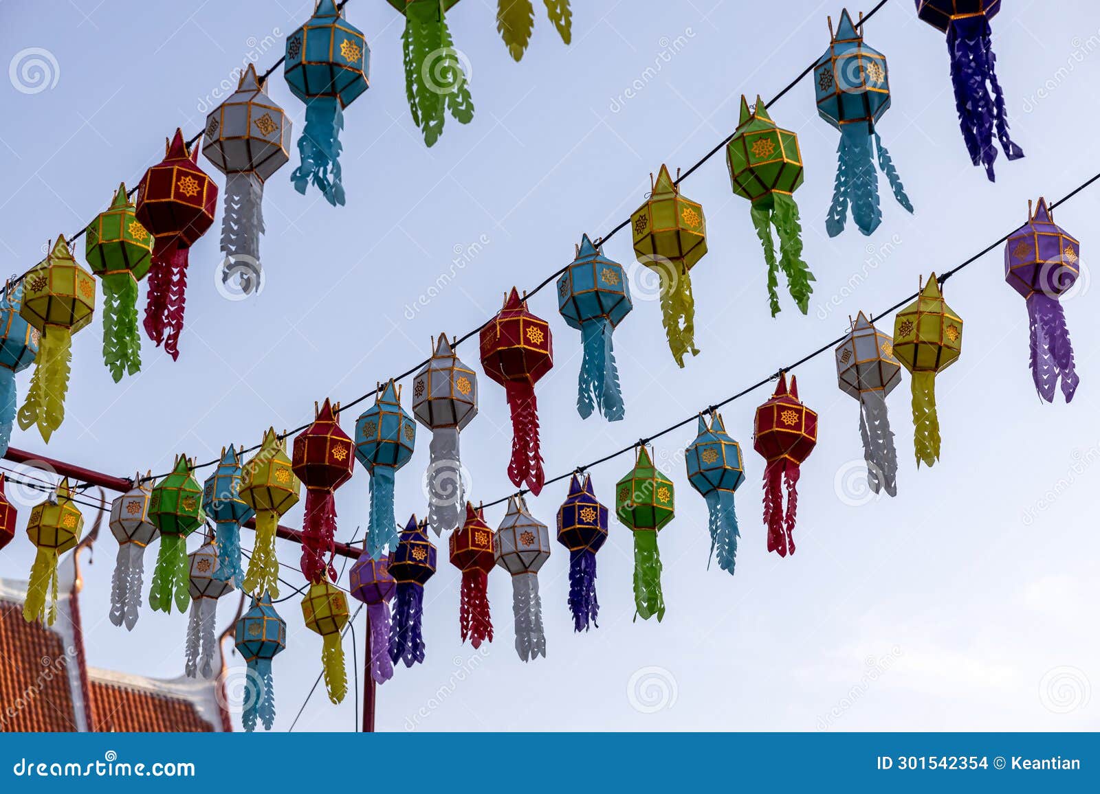 A View from Below of Colorful Lantern Flags Hanging on Strings of ...