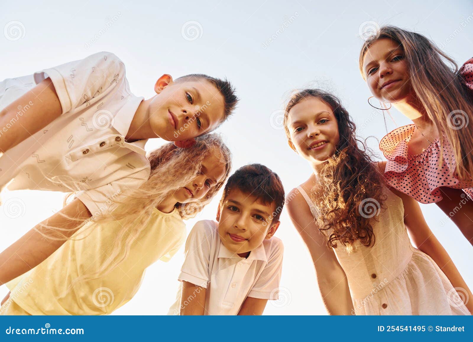 View from Below of Group of Kids that Looking Down and Having Fun Stock ...