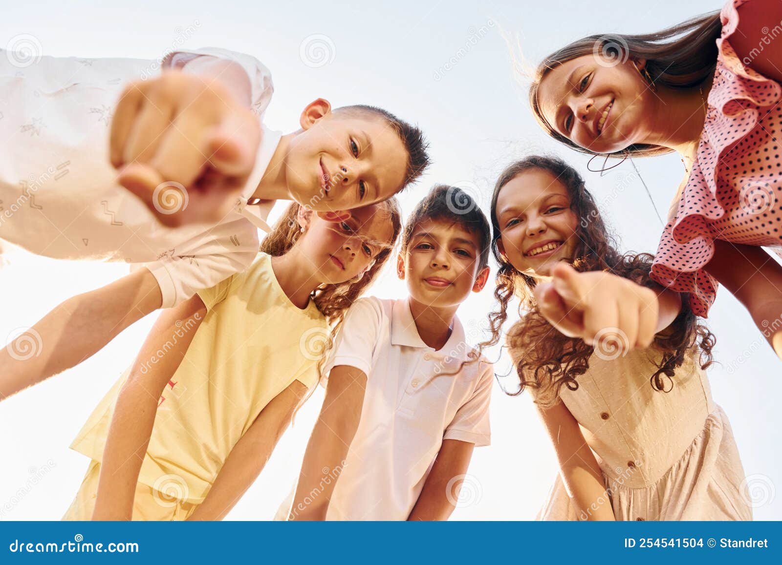 View from Below of Group of Kids that Looking Down and Having Fun Stock ...