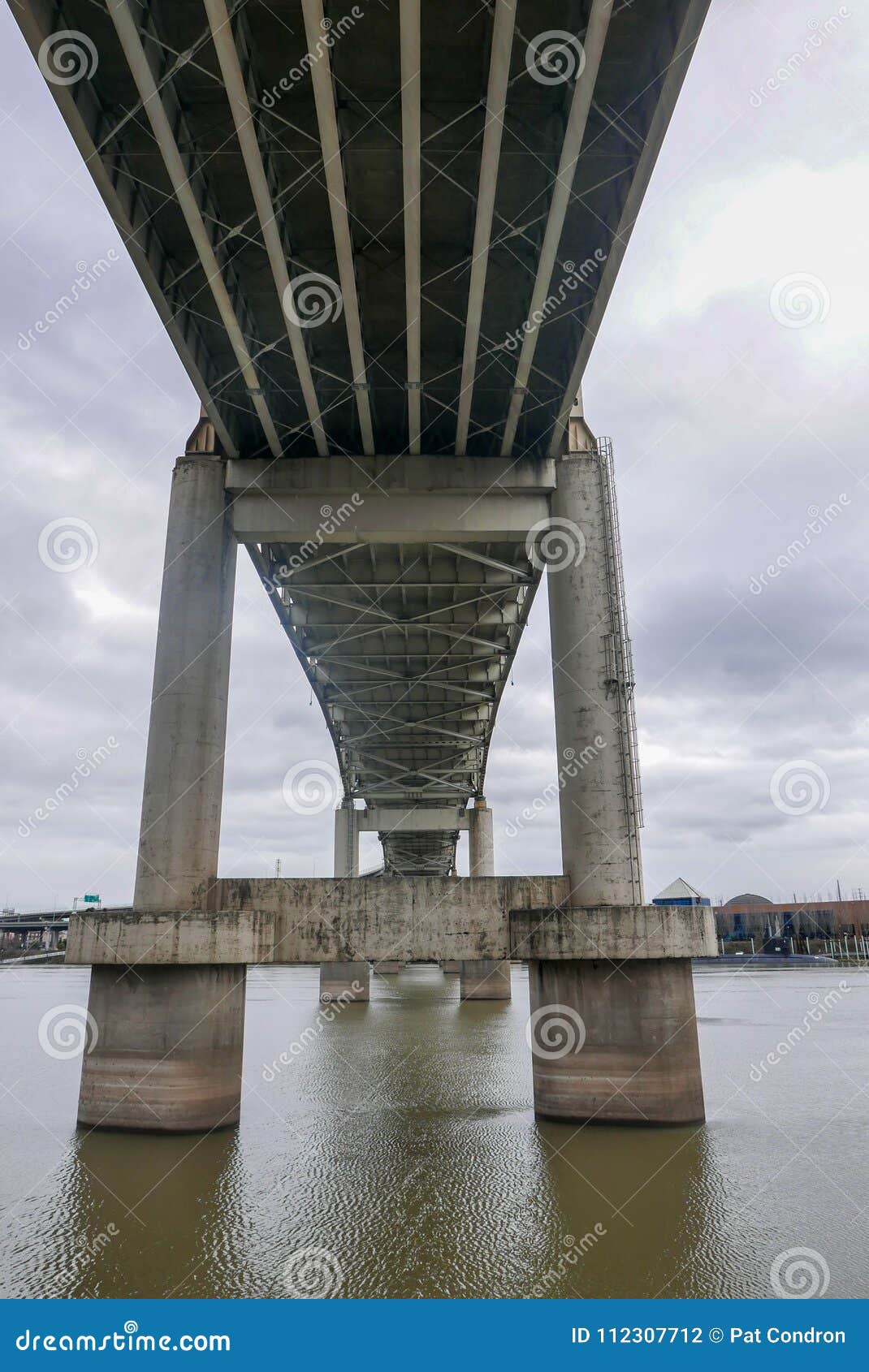 View from Below of Large Bridge Spanning the River Stock Photo - Image ...