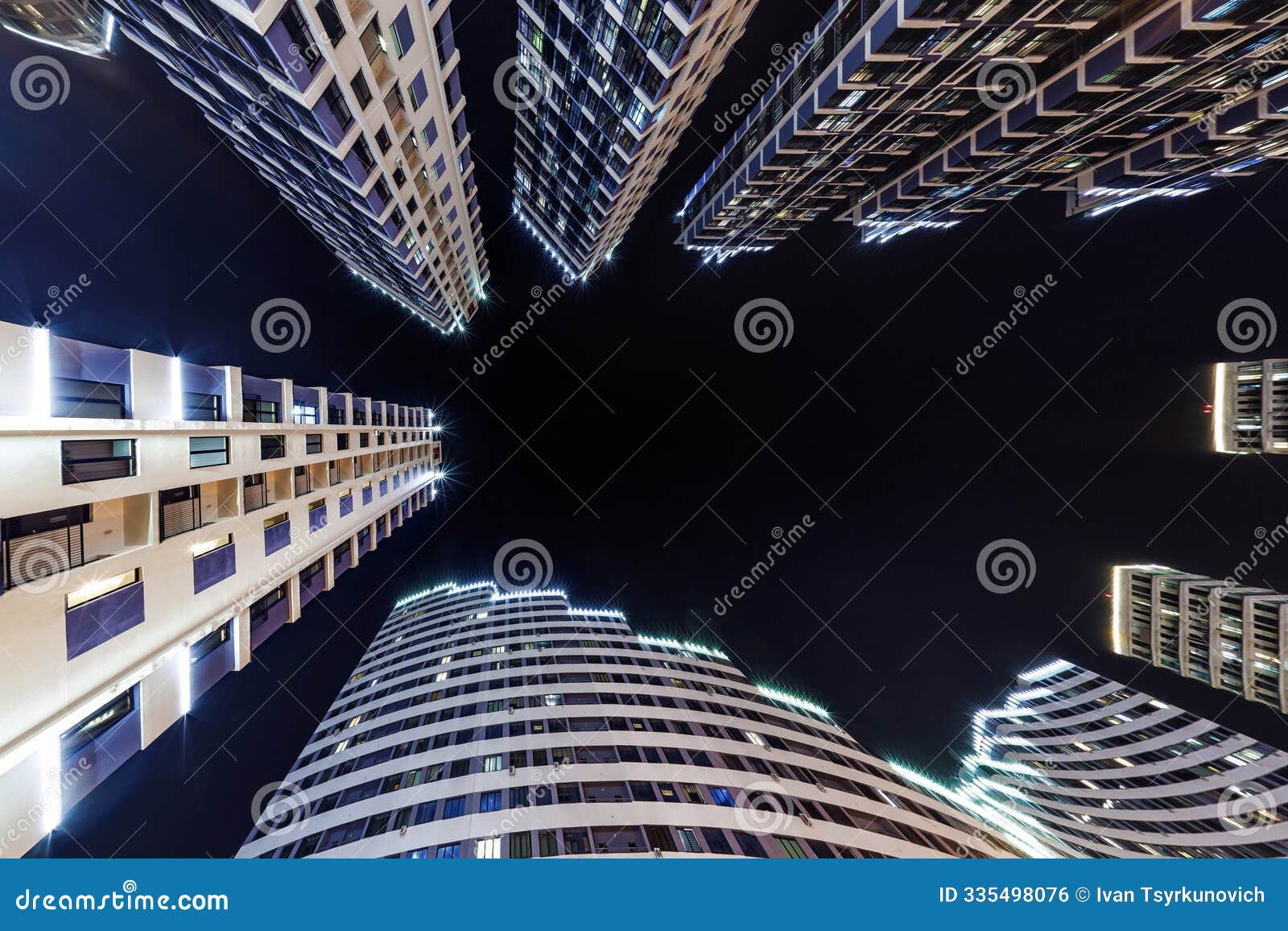 View from Below into Night Sky of Large Modern Skyscraper Residential ...