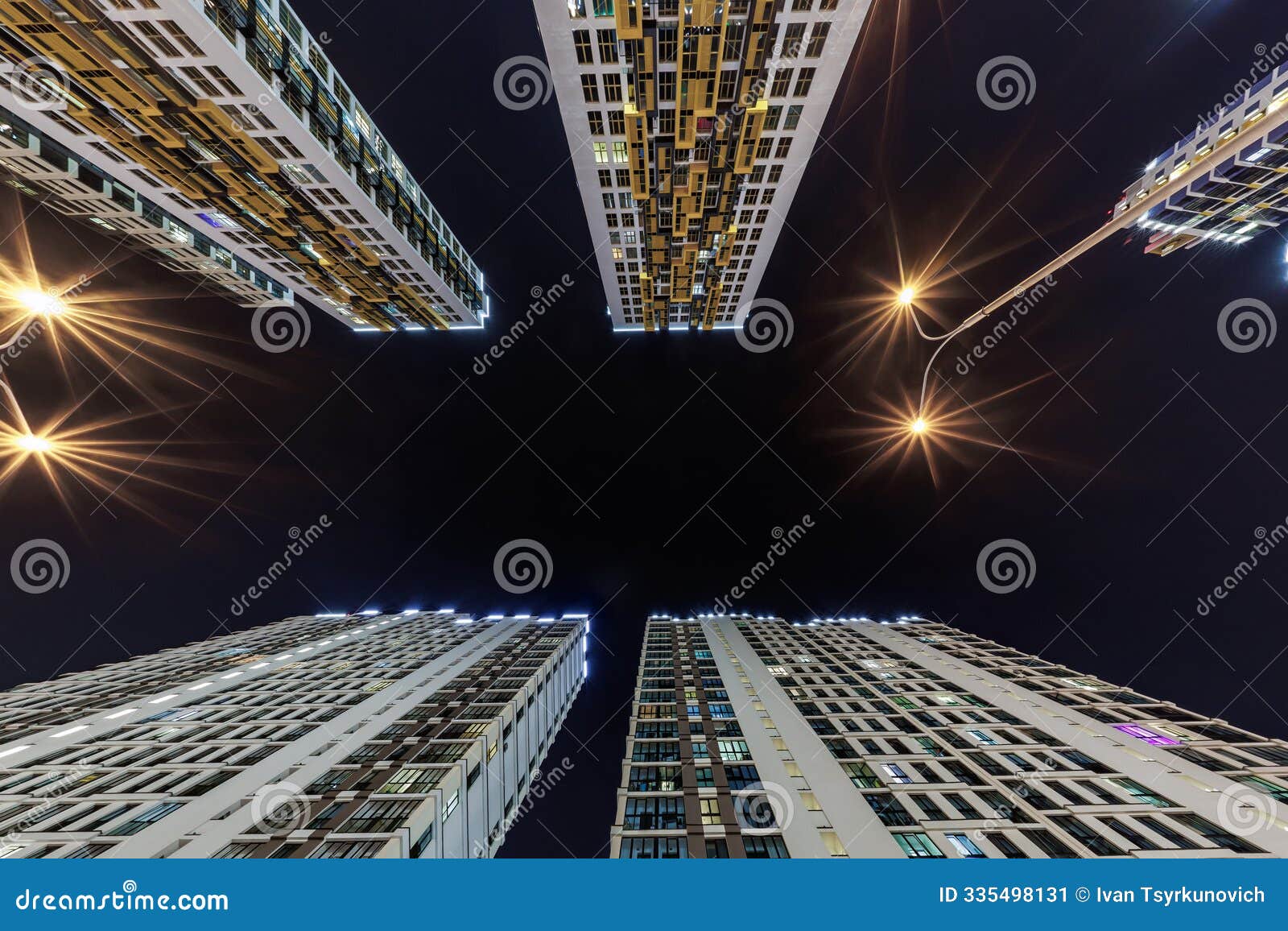 View from Below into Night Sky of Large Modern Skyscraper Residential ...