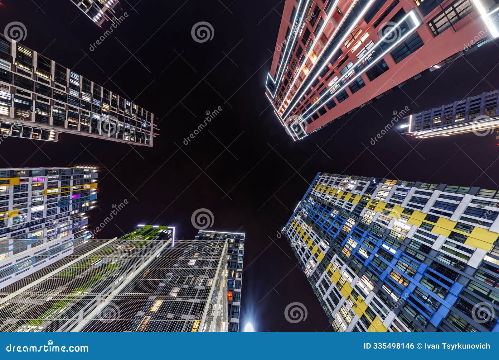 View from Below into Night Sky of Large Modern Skyscraper Residential ...