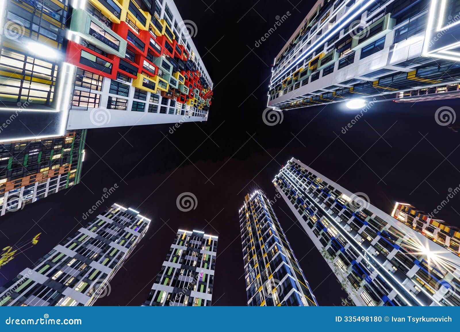 View from Below into Night Sky of Large Modern Skyscraper Residential ...