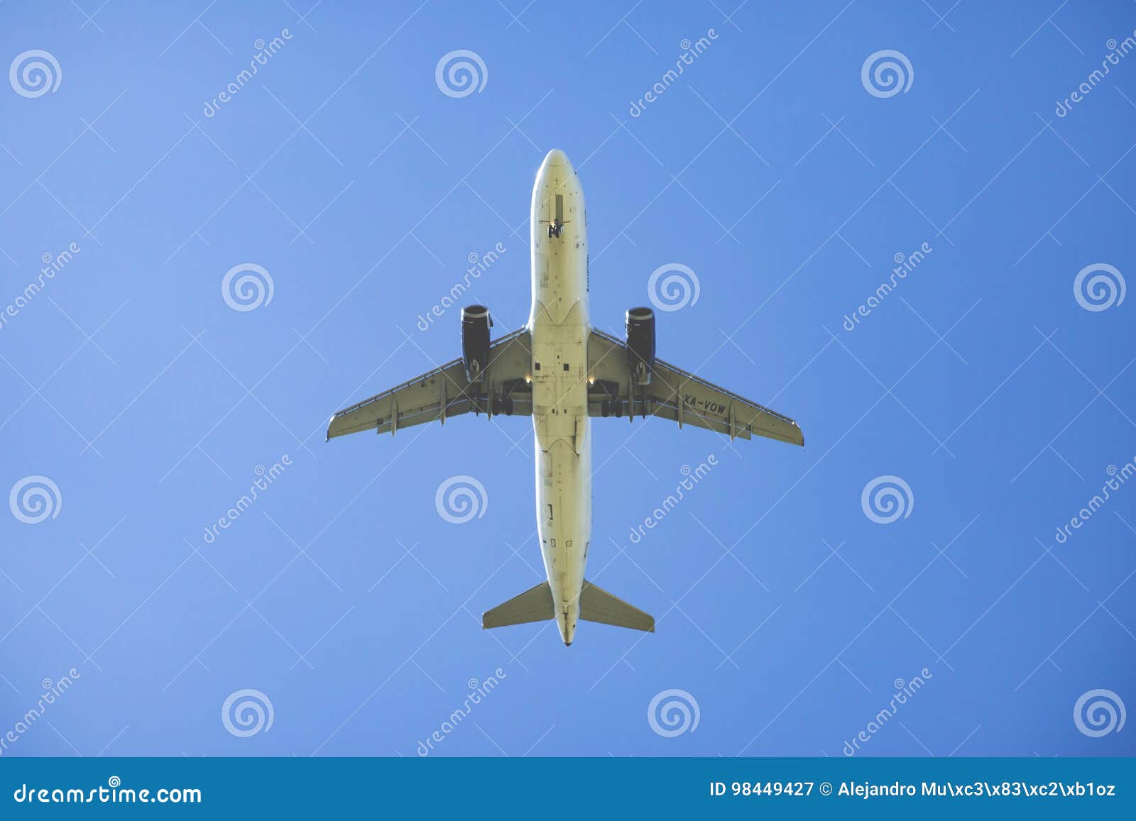 View from below a plane editorial photography. Image of blue - 98449427