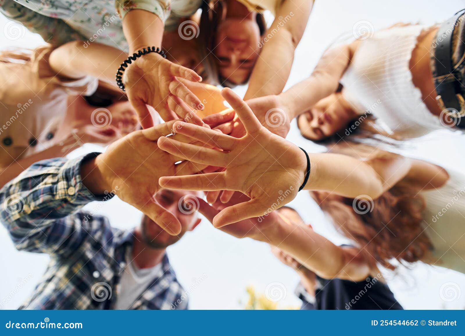 View from Below of Young Positive People that Looking Down Stock Photo ...