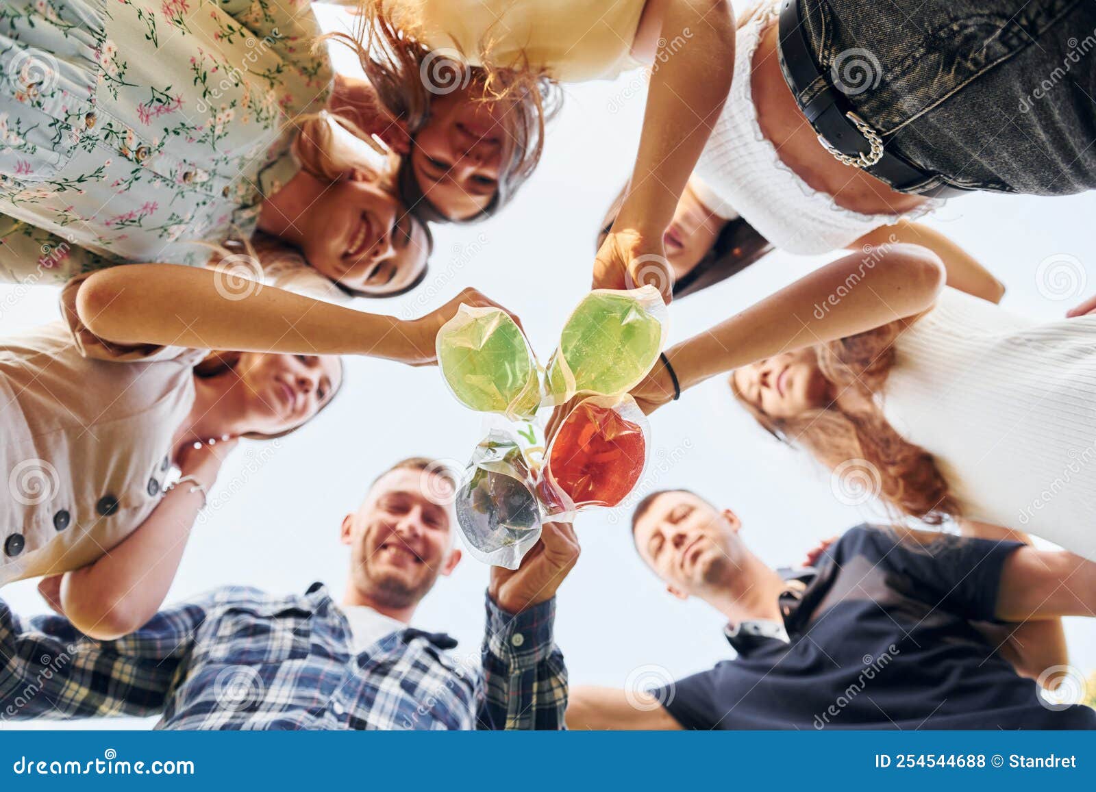 View from Below of Young Positive People that Looking Down Stock Photo ... View from Below of Young Positive People that Looking Down Stock Photo ...
