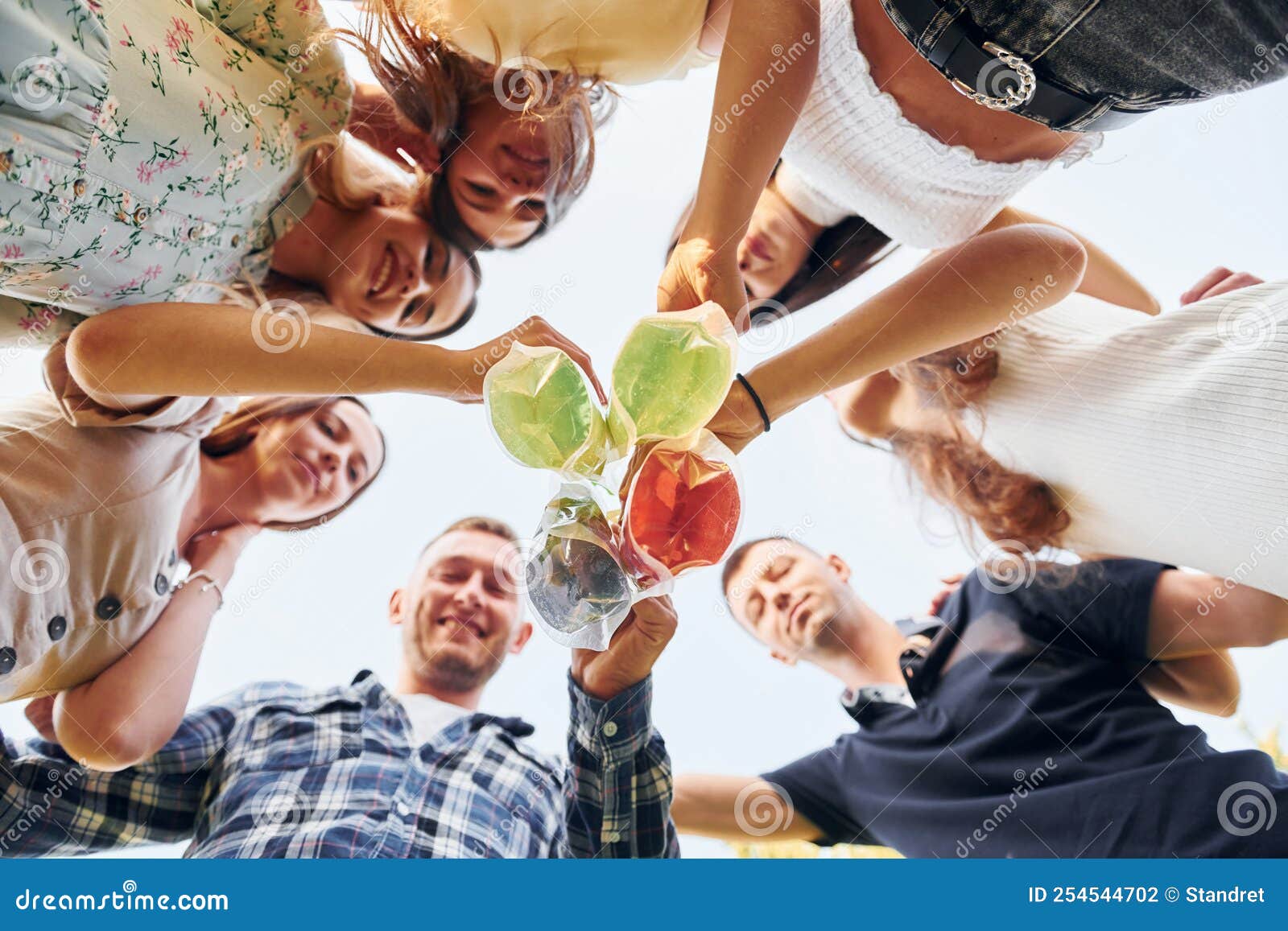 View from Below of Young Positive People that Looking Down Stock Photo ... View from Below of Young Positive People that Looking Down Stock Photo ...