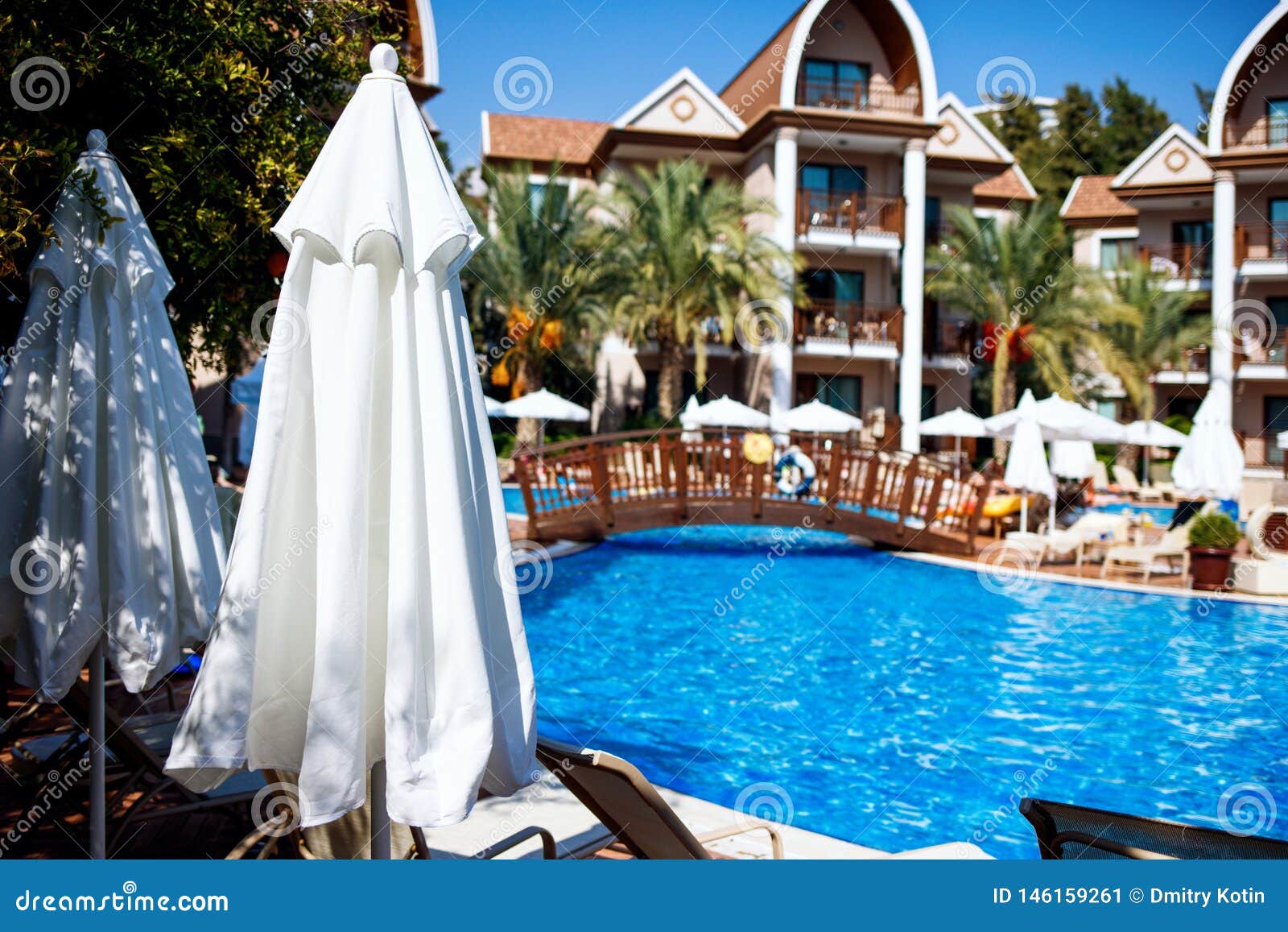 View on Big Blue Swimming Pool in Front of Hotel. Stock Image - Image ...