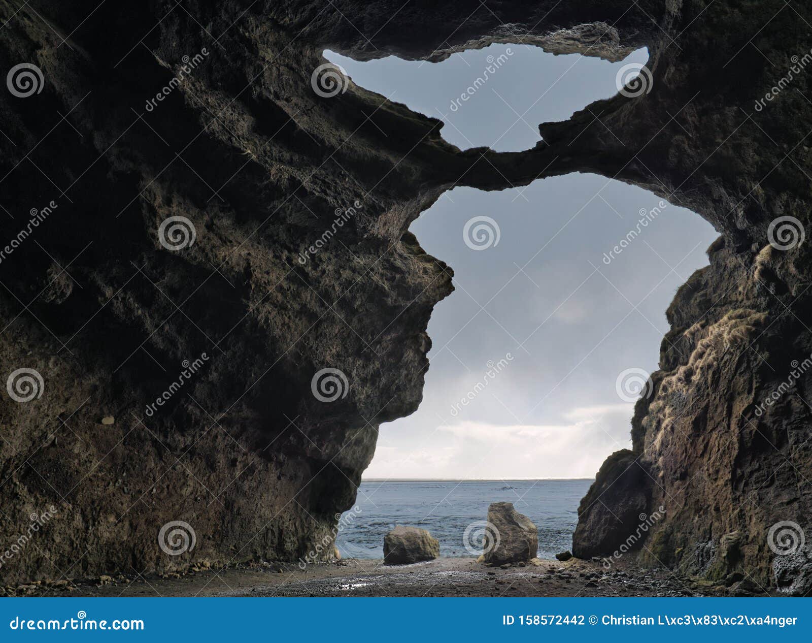A View from a Big Cave with Two Openings Stock Photo - Image of clouds ...