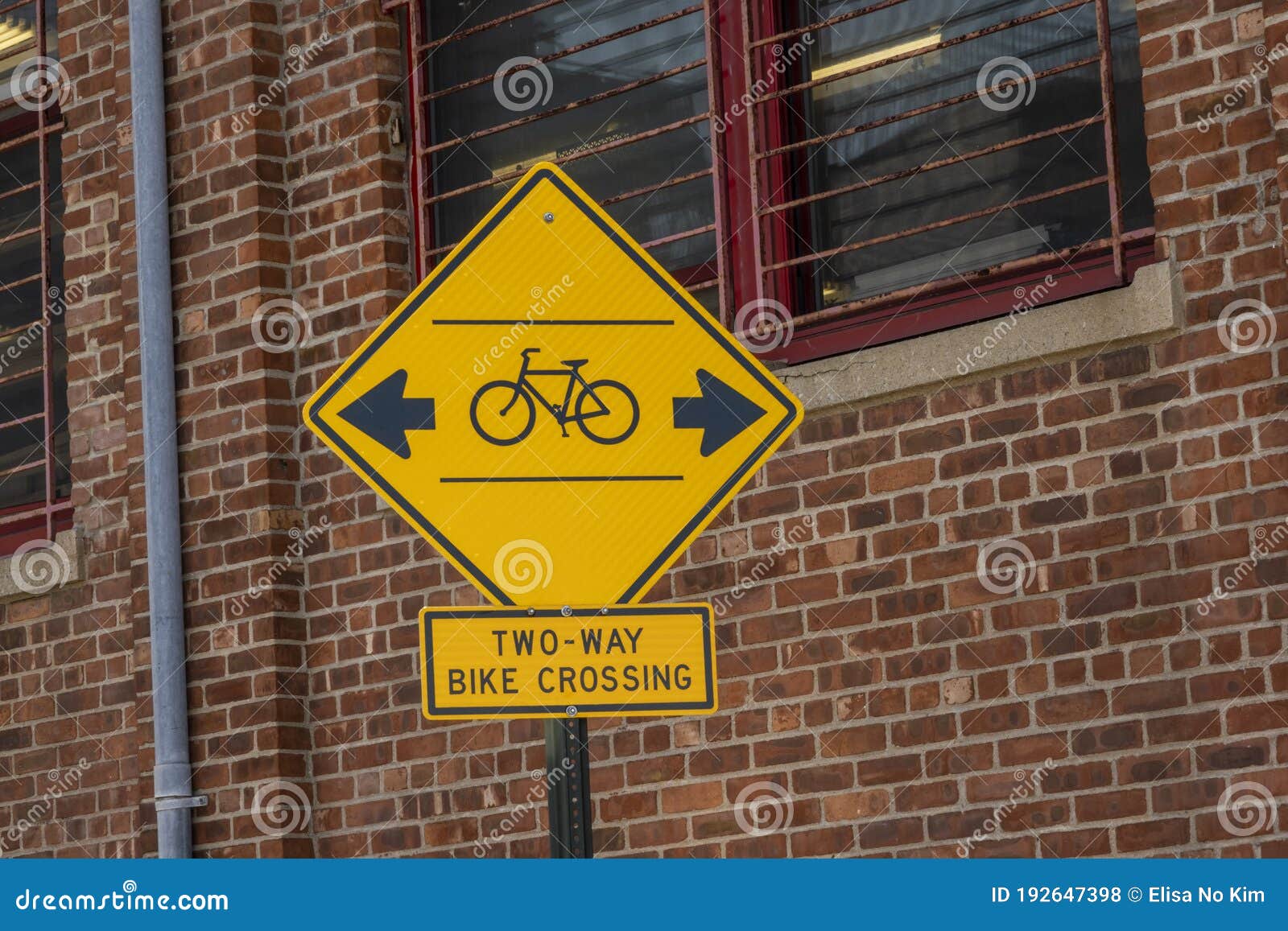 Bike signs stock photo. Image of view, brick, signs - 192647398