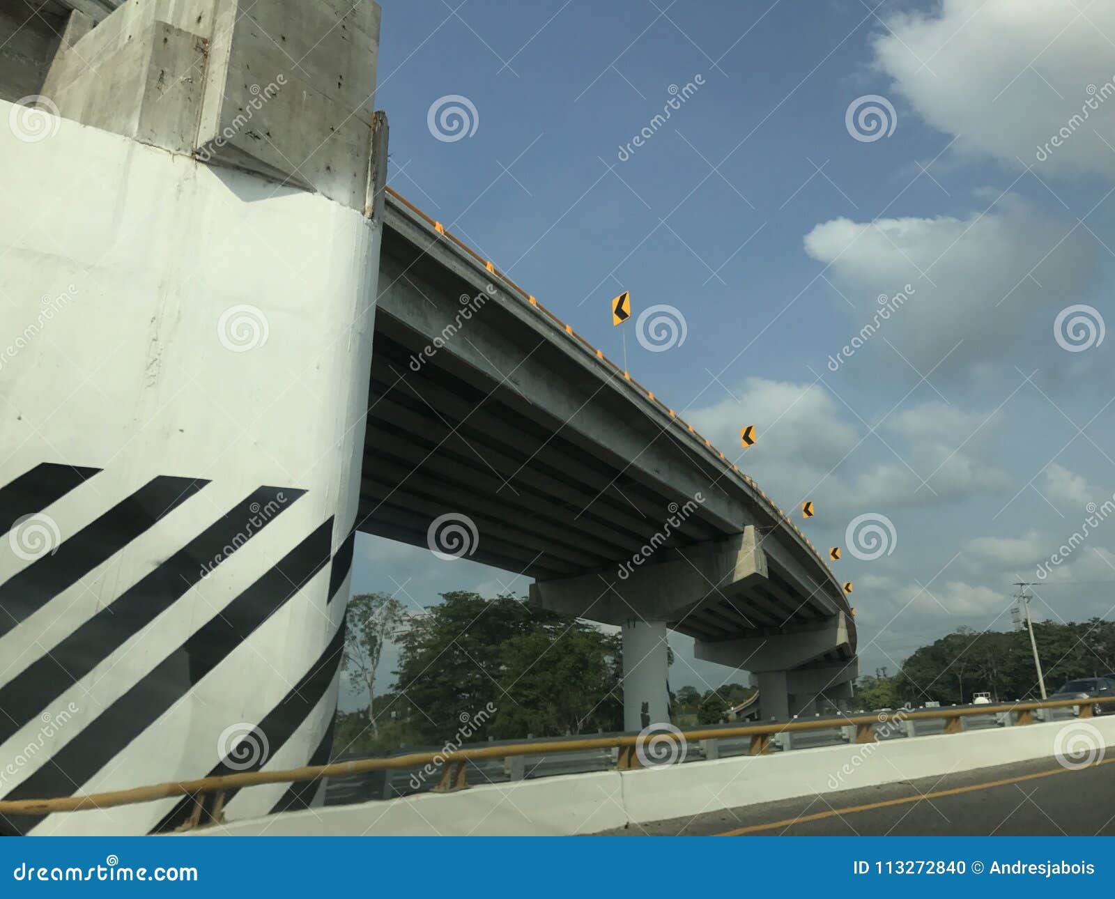 View of the Highway with a Bridge at the Left Side Stock Photo - Image ...