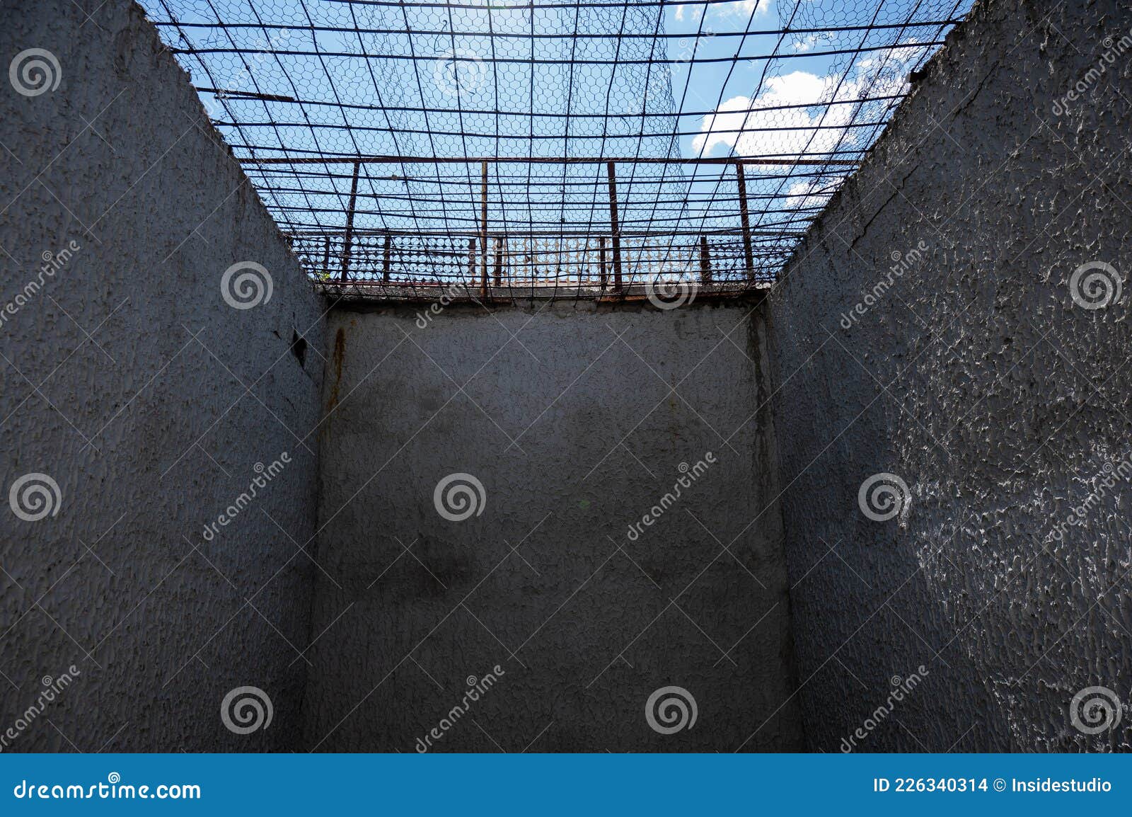 View of the Blue Sky through the Bars of the Prison Cell Stock Photo ...