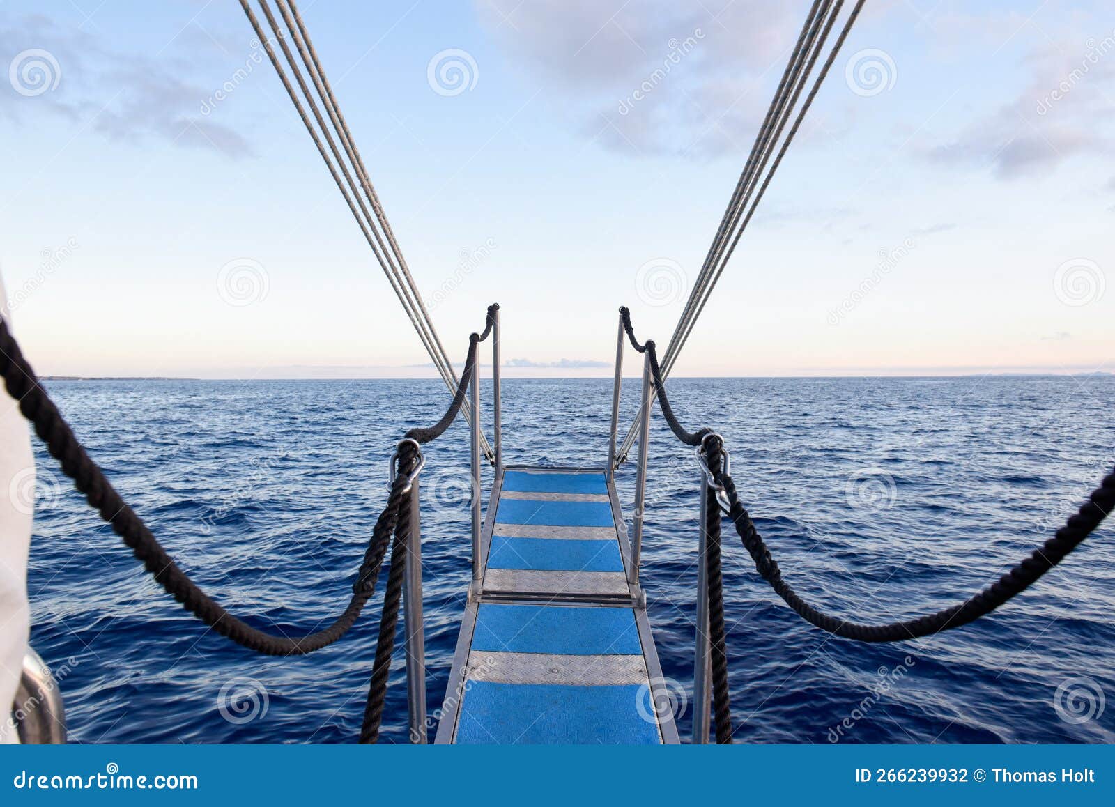 View from a Boat with Ladder Suspended Over Ocean Water Stock Photo ...