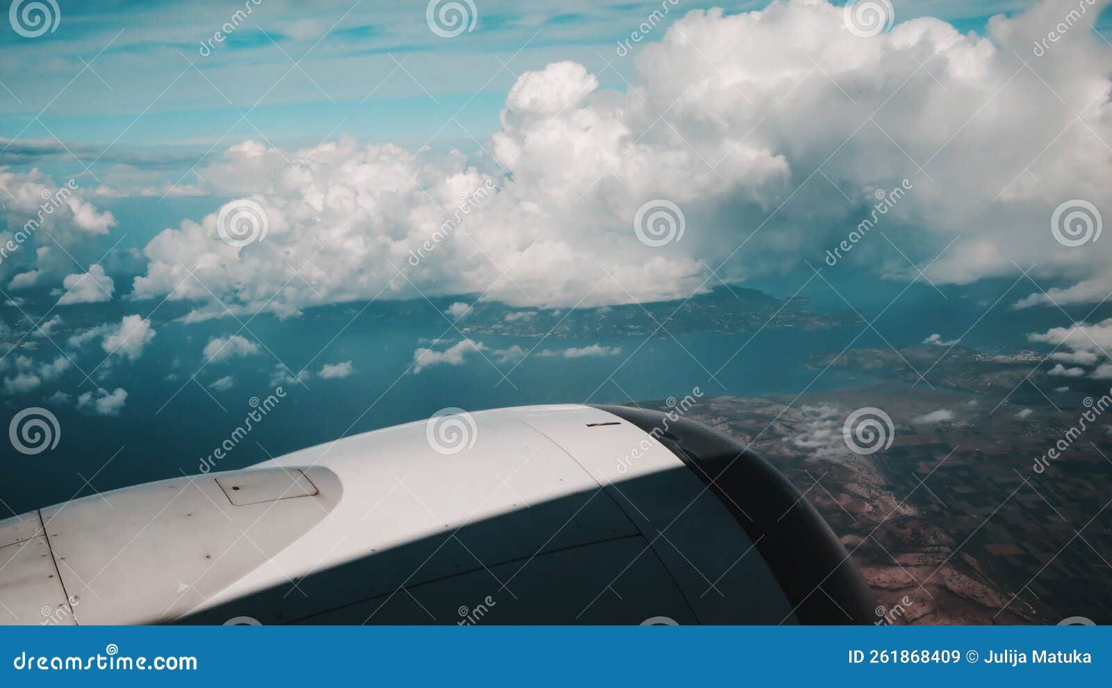 View from Boeing 737 MAX 8 on White Air Clouds, Clear Blue Sky and ...