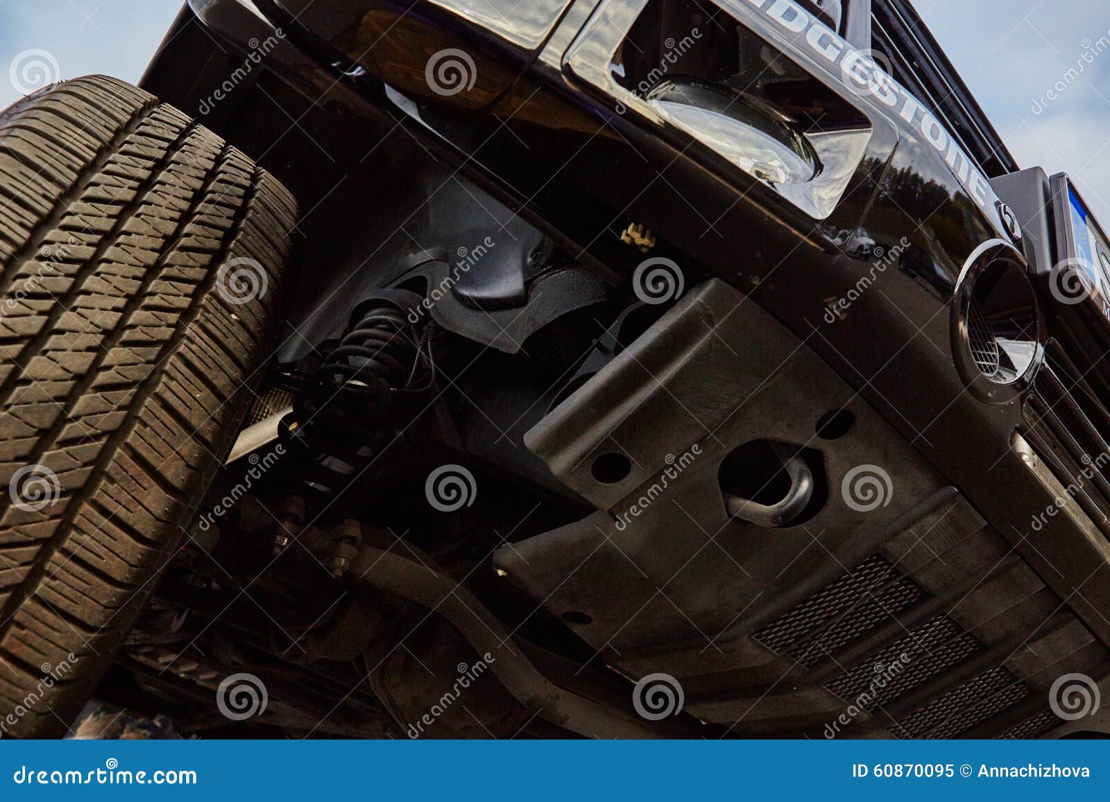 View from the Bottom of a Car Stock Image - Image of coveralls, mirror ...