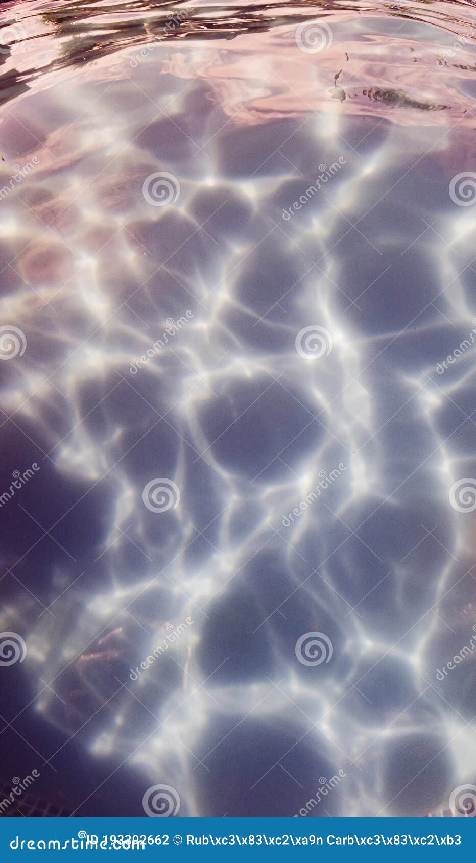 View of the Bottom of a Swimming Pool with a Rippled Light Effect Stock ...
