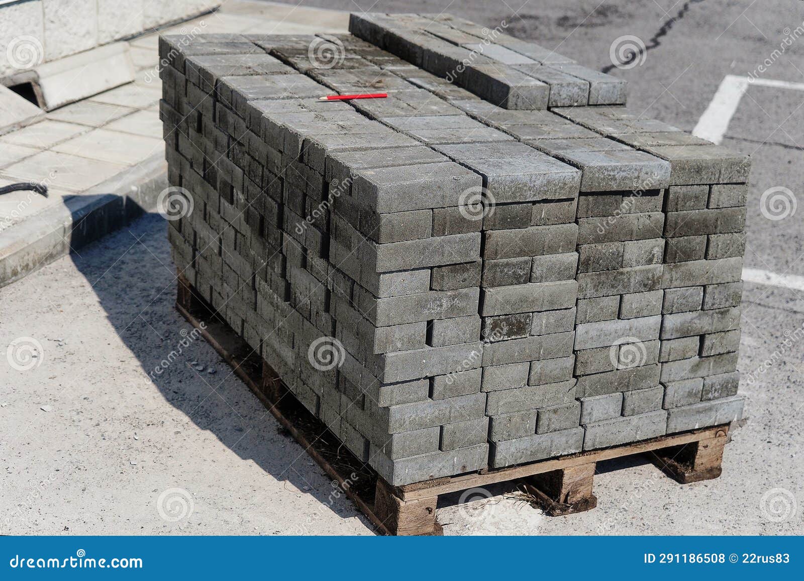 View of Bricks on Wooden Pallet on Summer Day. Construction Material ...