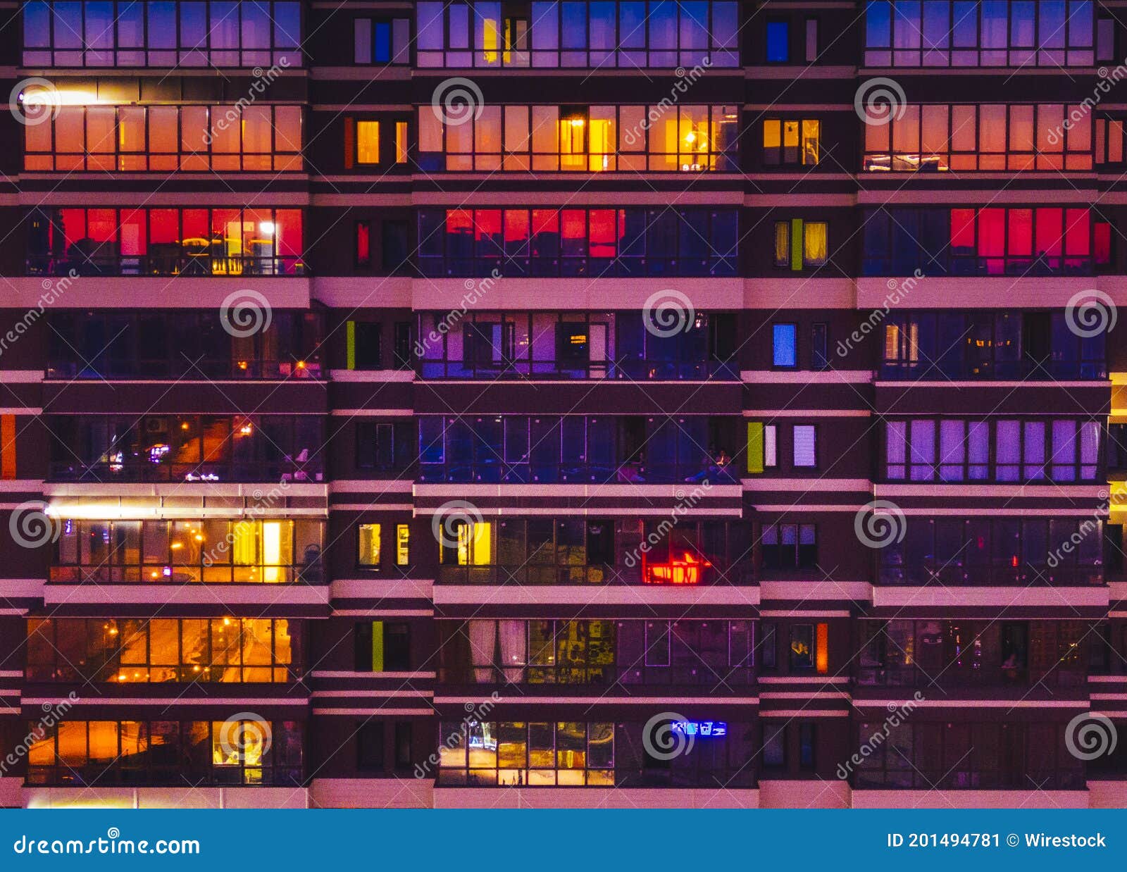 View of Building with Glass Windows and Reflection of Lights during ...