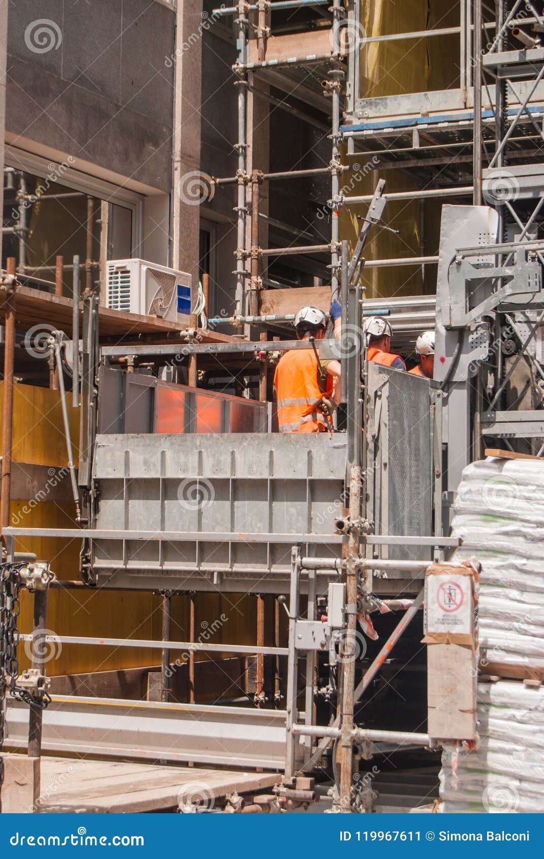 3 Workers are Working on a Elevator Editorial Photo - Image of hoist ...